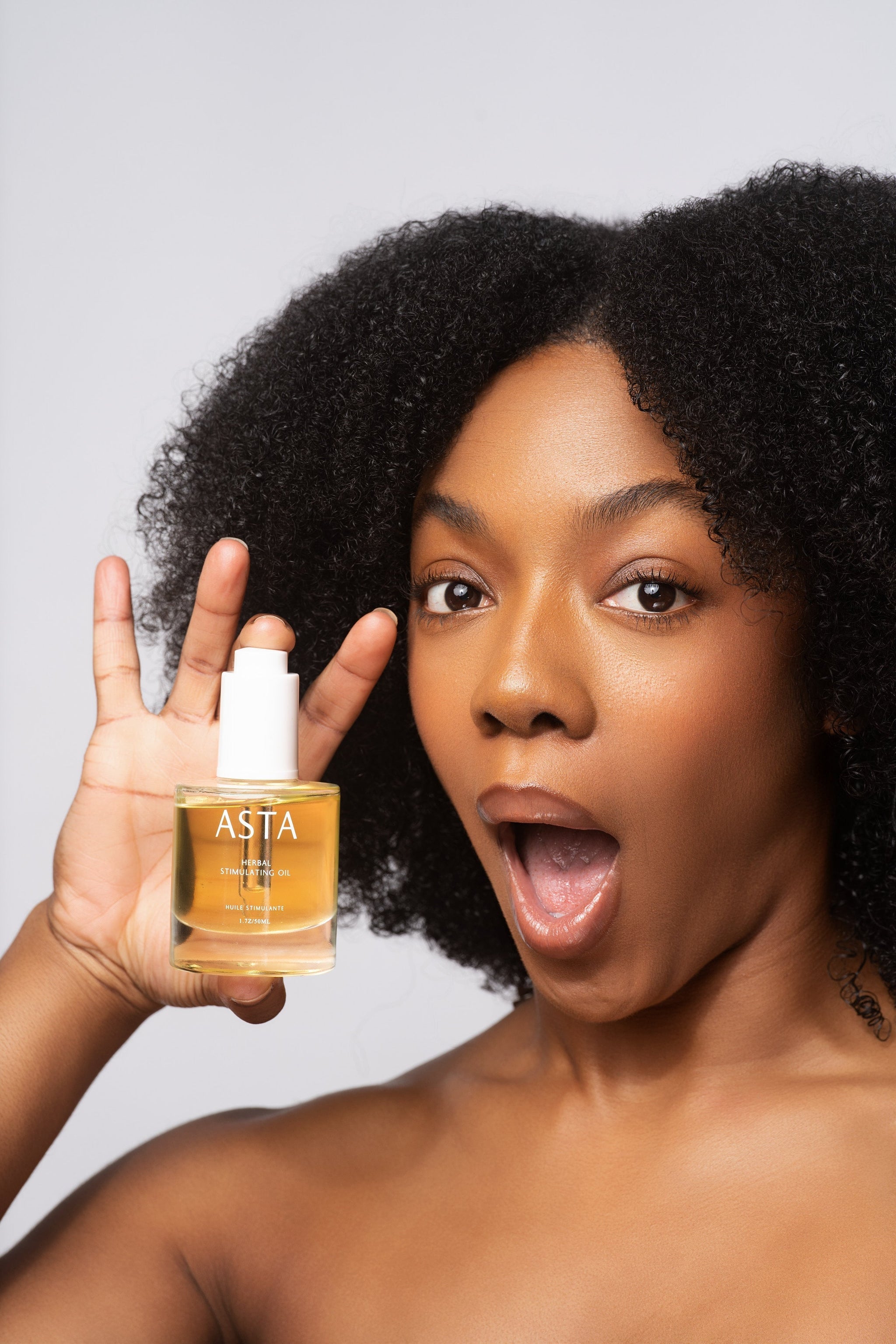 Transform Your Scalp with Asta's Herbal Stimulating Oil